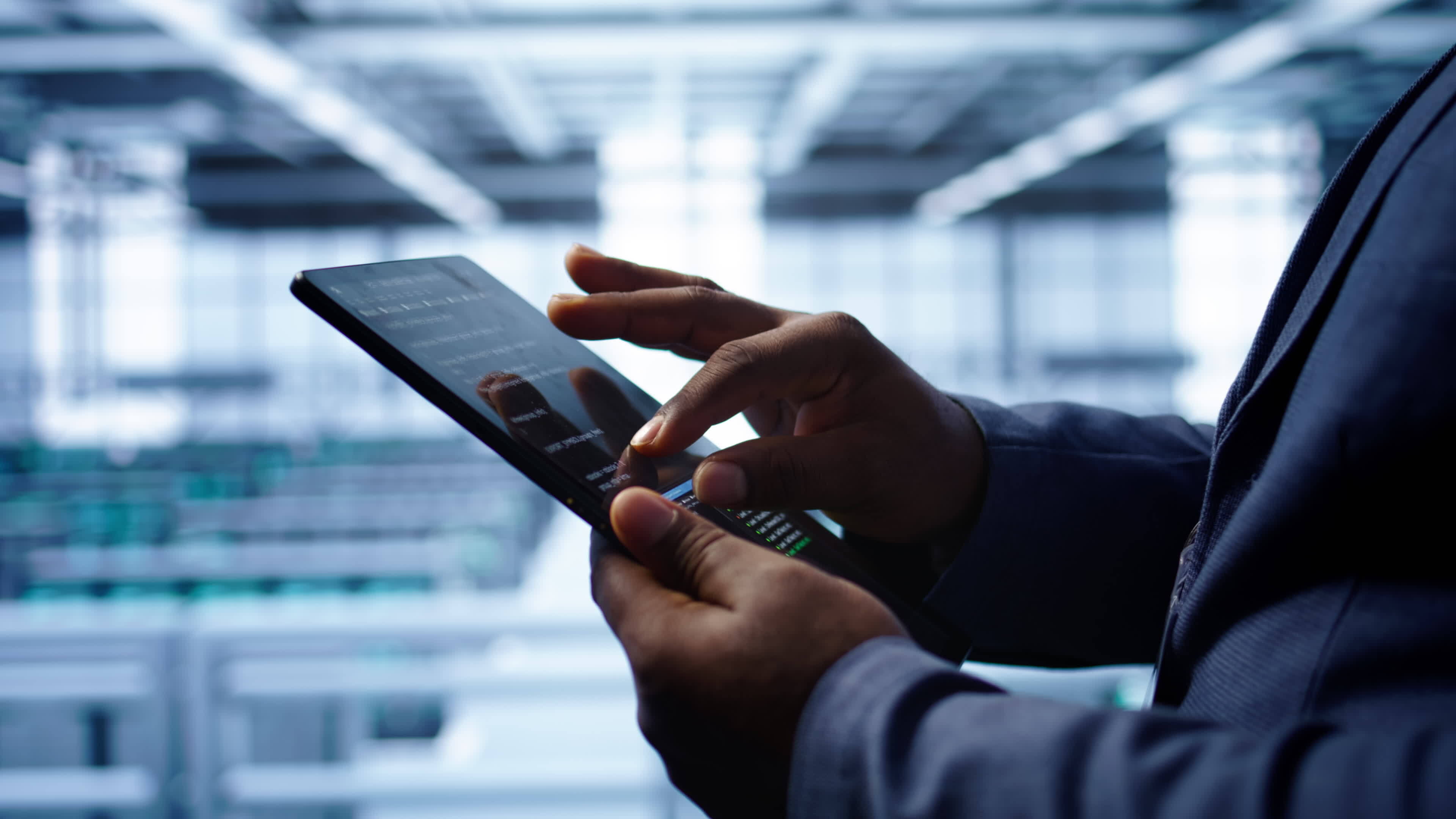 Software Developer Does Yearly Checkup Using Tablet To Prolong Data