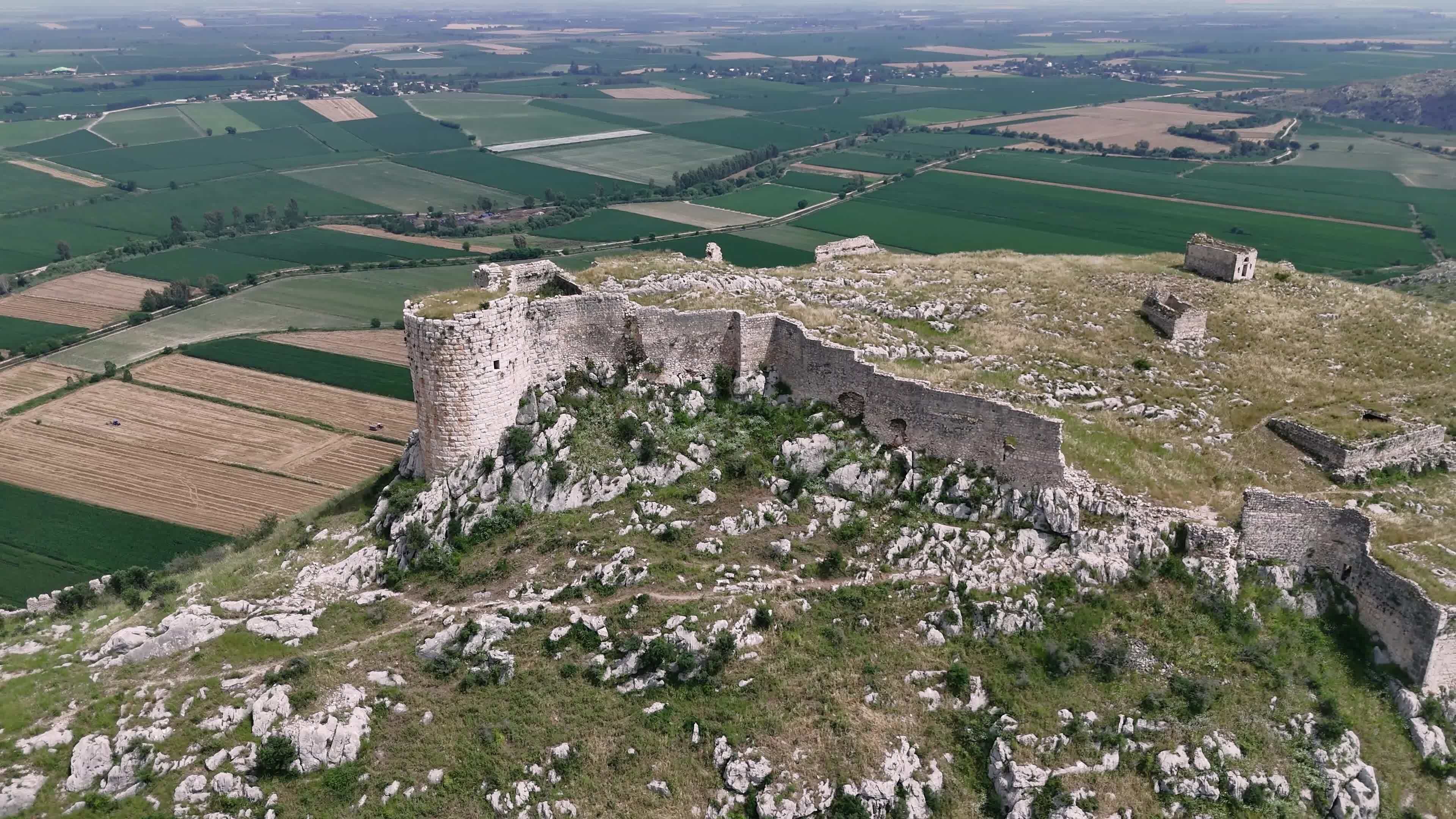 Drone view ruins of ancient Anavarza castle on top of mountain in Adana Fortified wall remnants ...