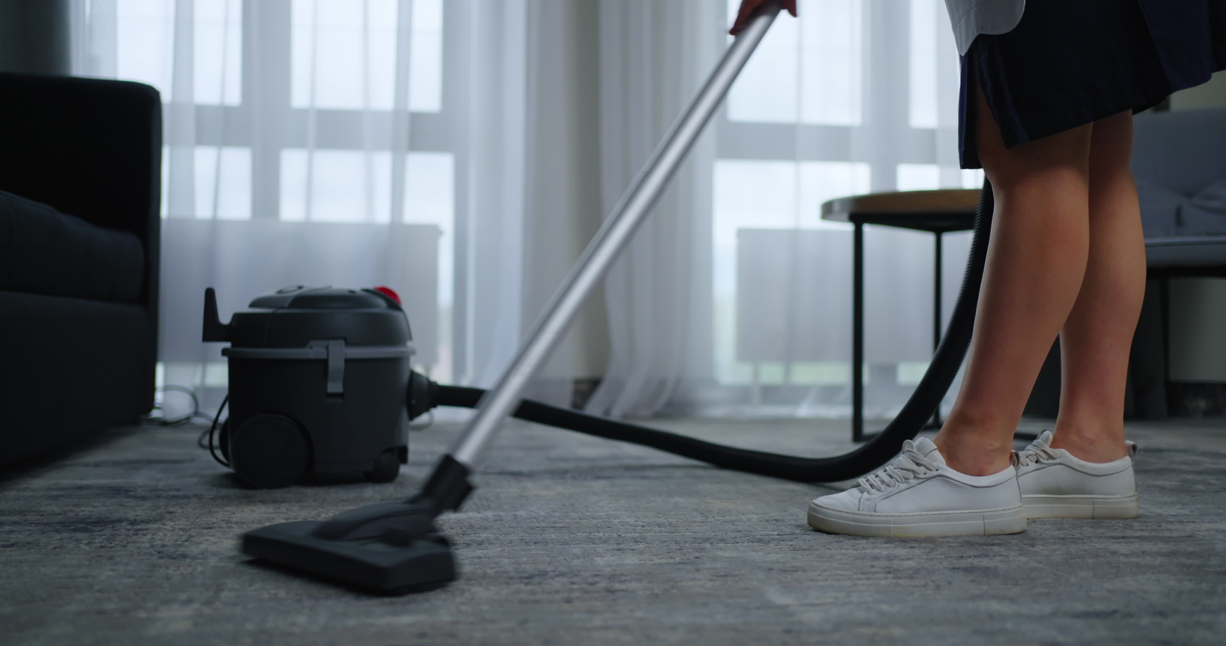 Vacuum Cleaner And Legs Of Professional Maid, Housekeeping In Hotel Room, Woman Hoovering Floor ...