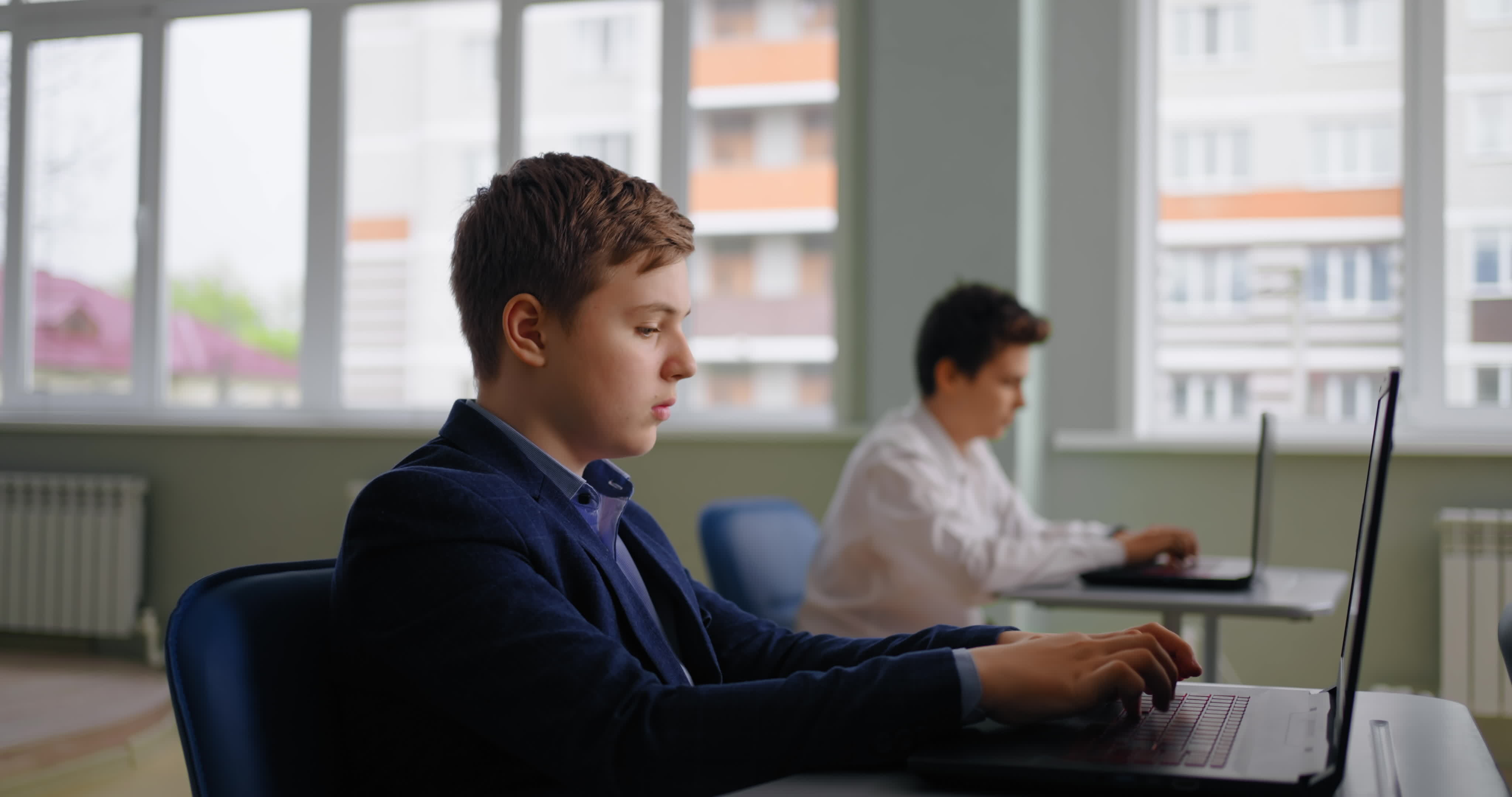 Caucasian Pupils Boys Working With Laptops In Computer-Based Class, Web-Design And Coding ...