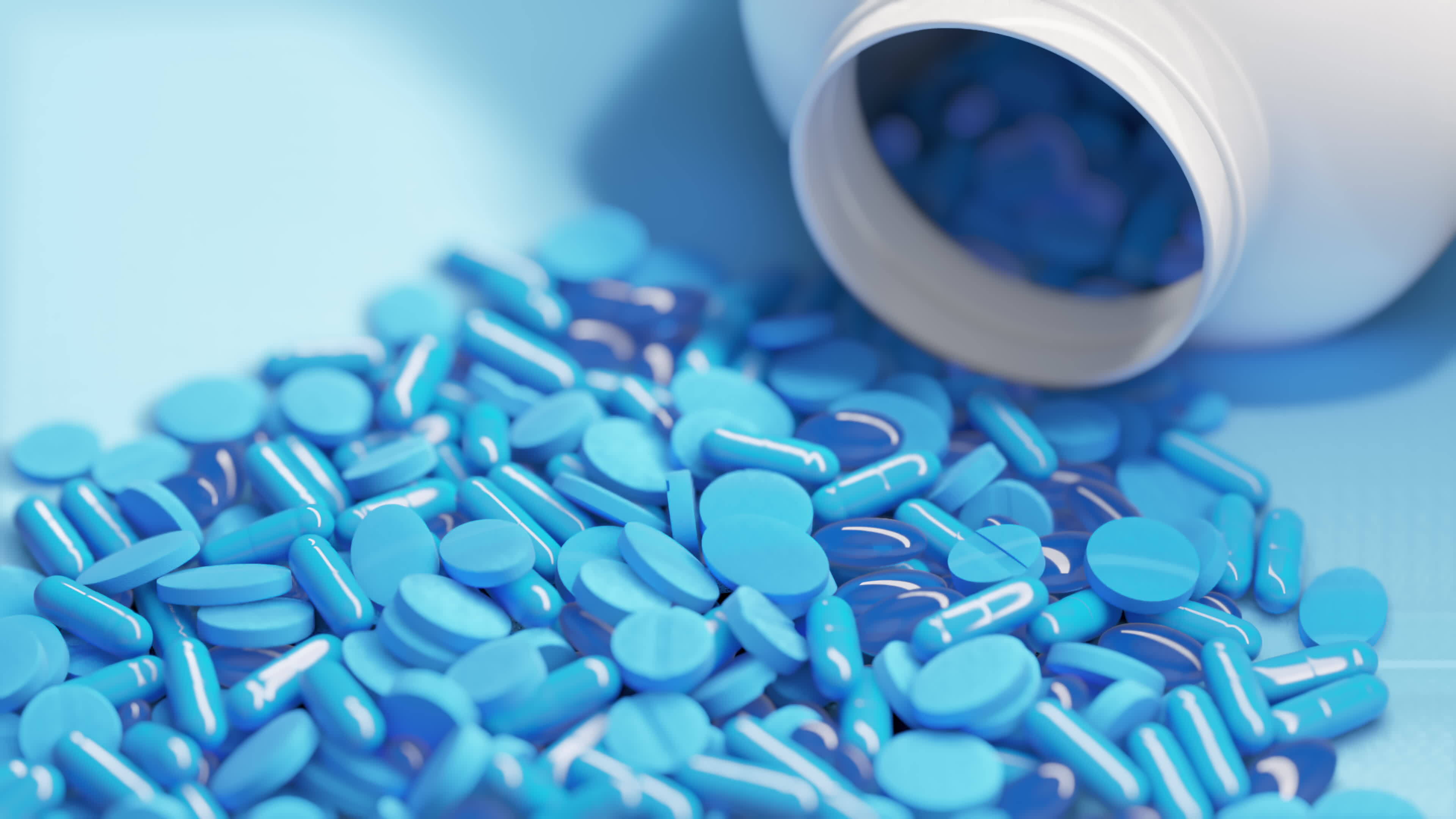Spilled Bottle of Blue Pills and Capsules 46946998 Stock Video at Vecteezy Spilled Bottle of Blue Pills and Capsules 46946998 Stock Video at Vecteezy