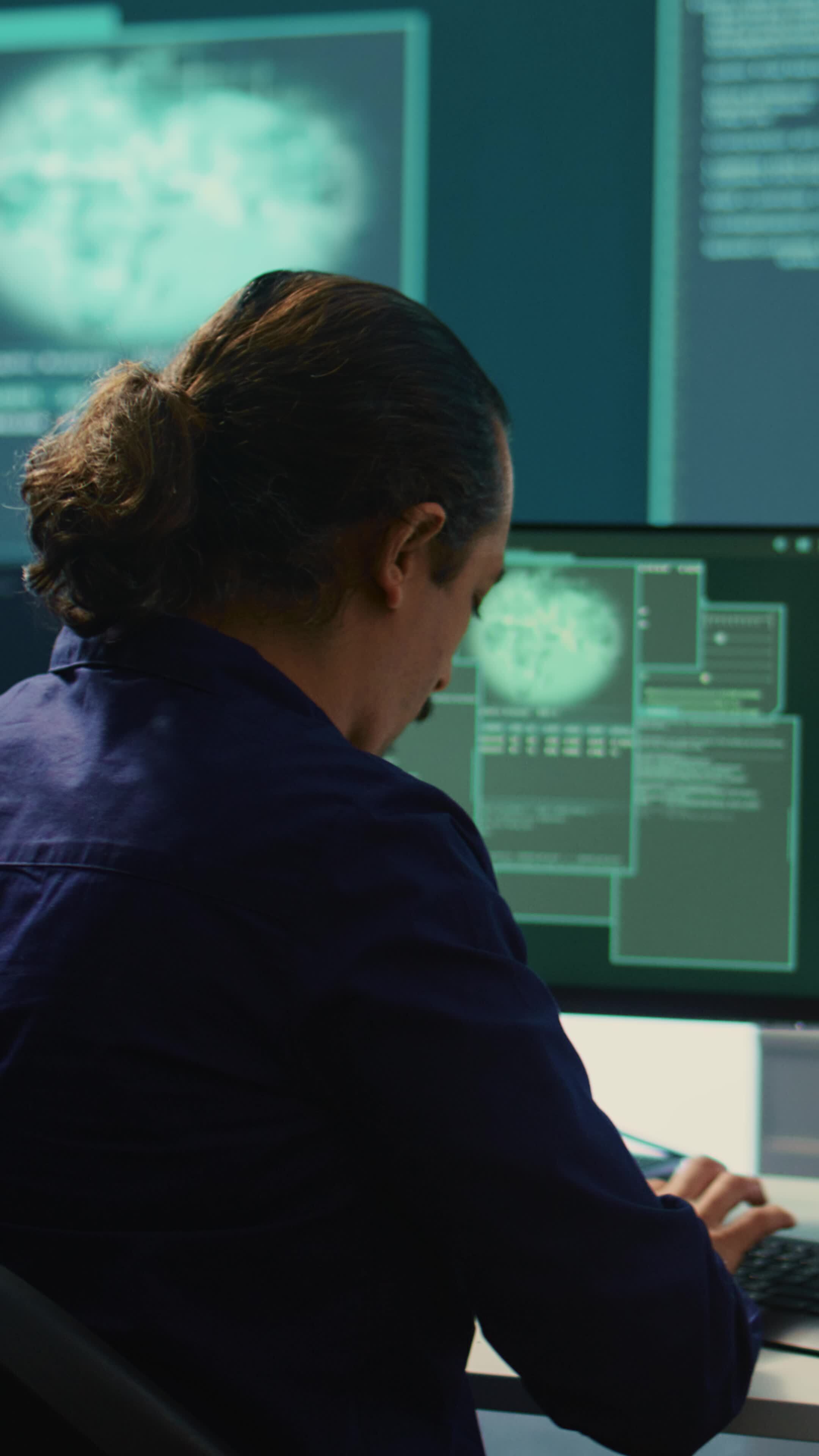 Vertical Governmental It Expert Monitoring Cyber Threats On A Computer