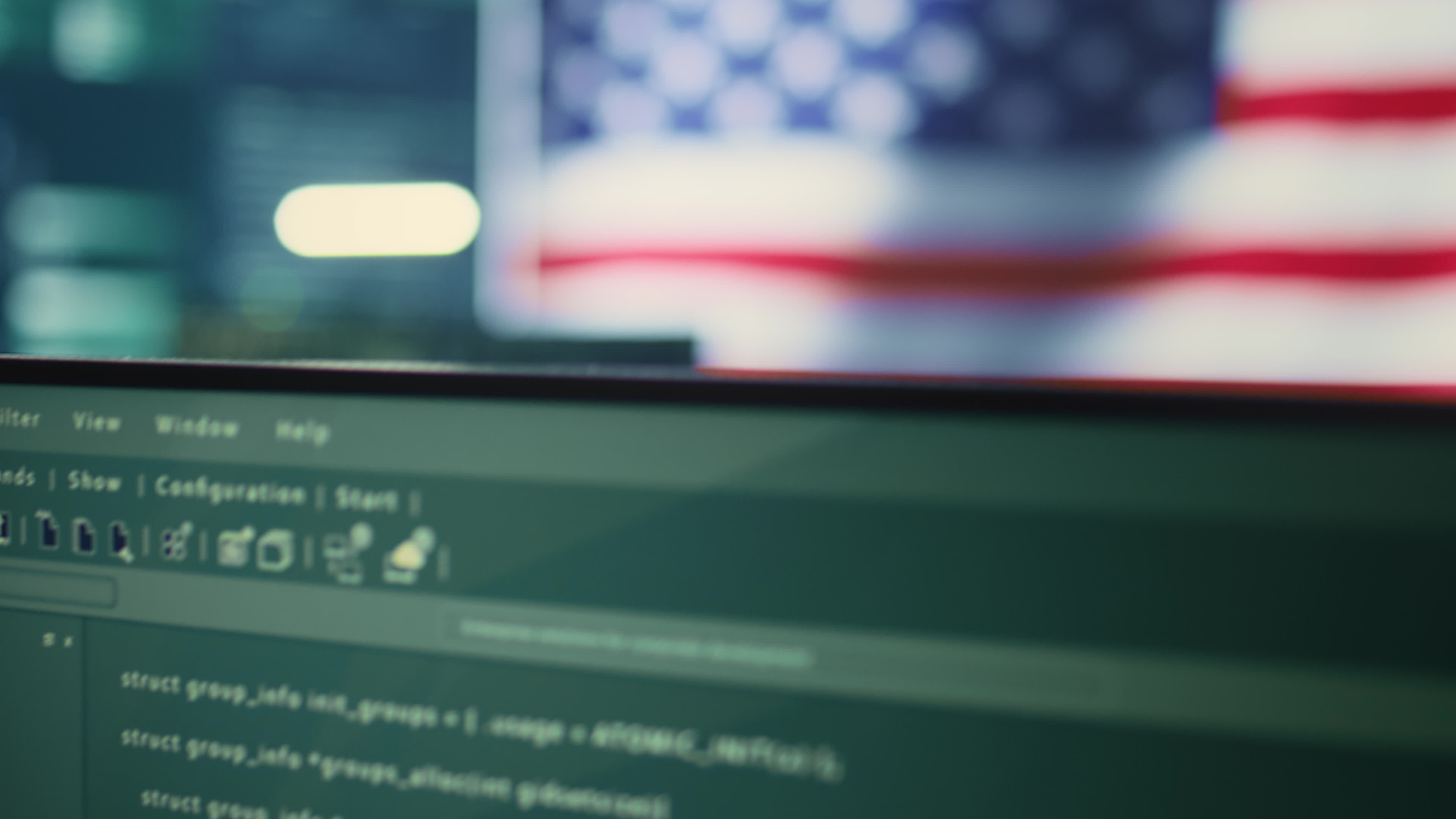 Cyber intelligence and secure operations center with USA flag on big screen. Highlighting ...