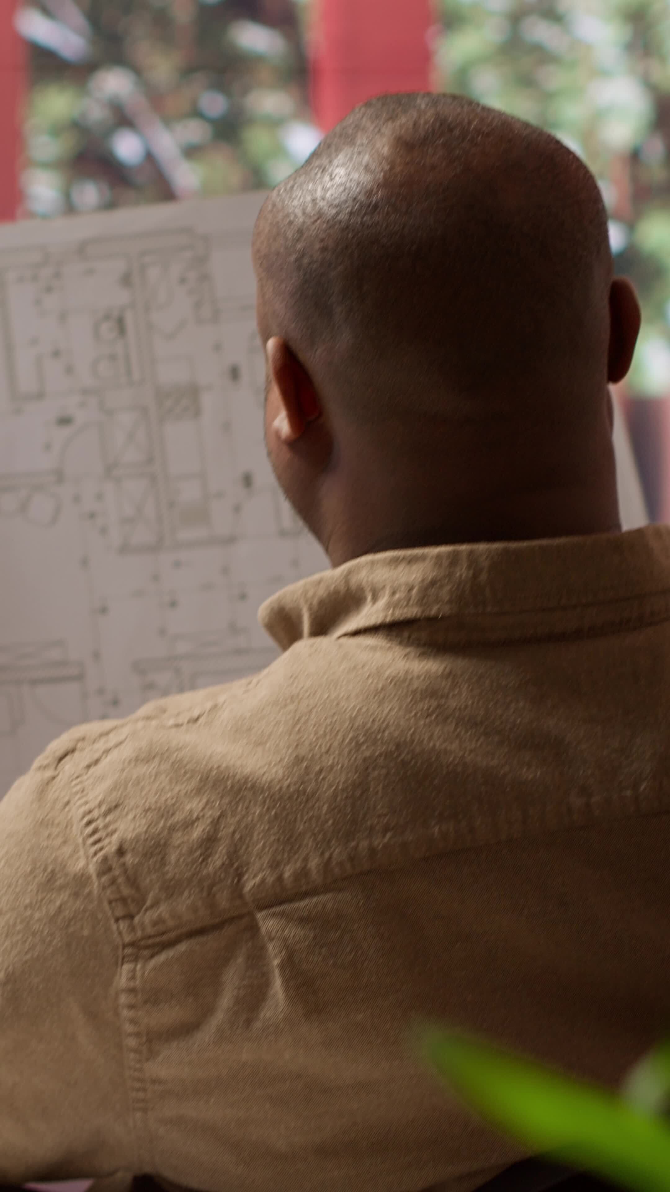 Vertical Business Owner Using Digital Tools To Review And Evaluate