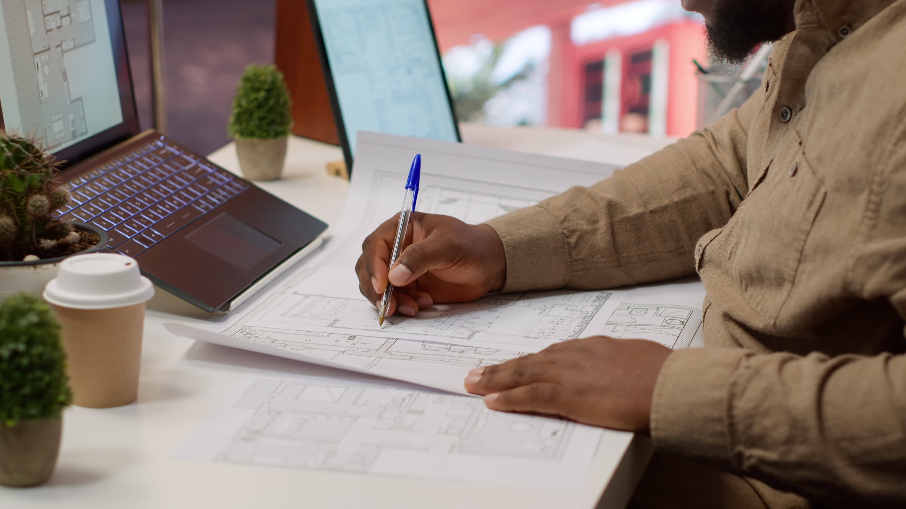 Corporate Owner Measuring And Evaluating Office Blueprints And