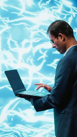 Vertical System Administrator Working On Laptop Programming Artificial