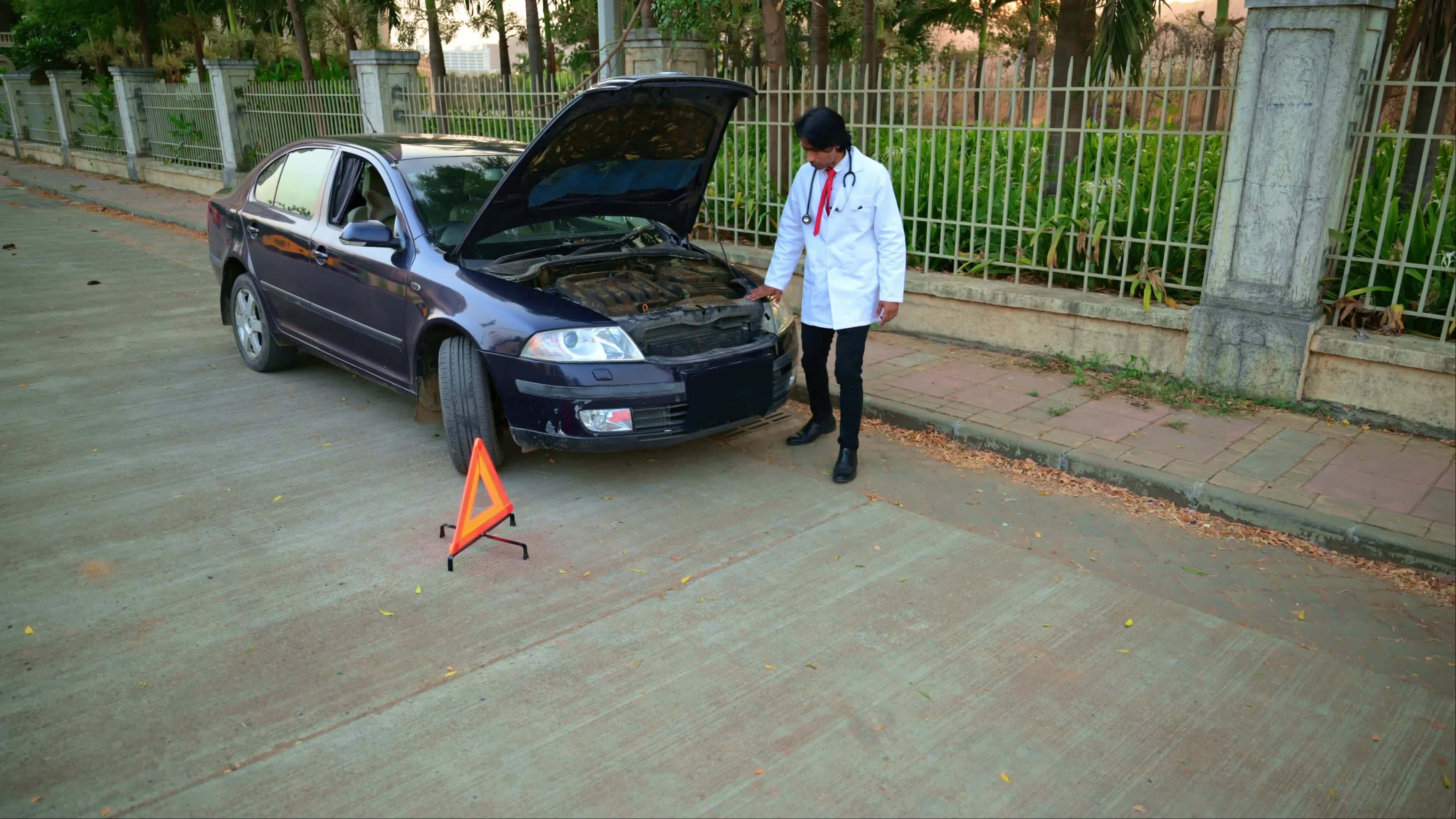 Doctor facing problem while breakdown his car 47381811 Stock Video at ... Doctor facing problem while breakdown his car 47381811 Stock Video at ...