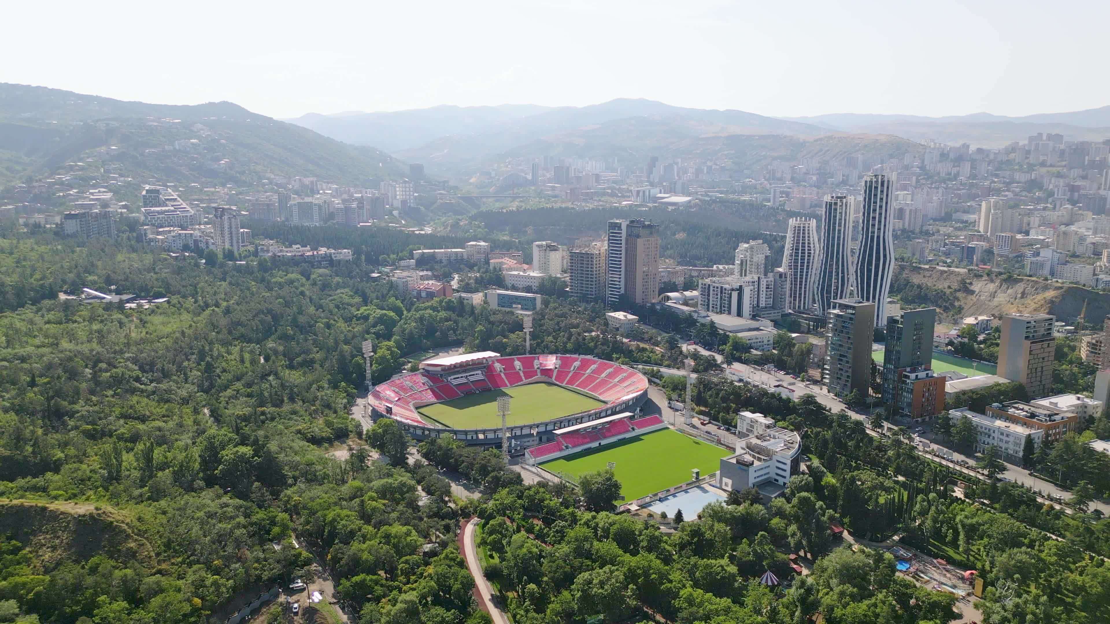 Tbilisi, Georgia- 4th july, 2024 - aerial ascending revealing view The ... Tbilisi, Georgia- 4th july, 2024 - aerial ascending revealing view The ...