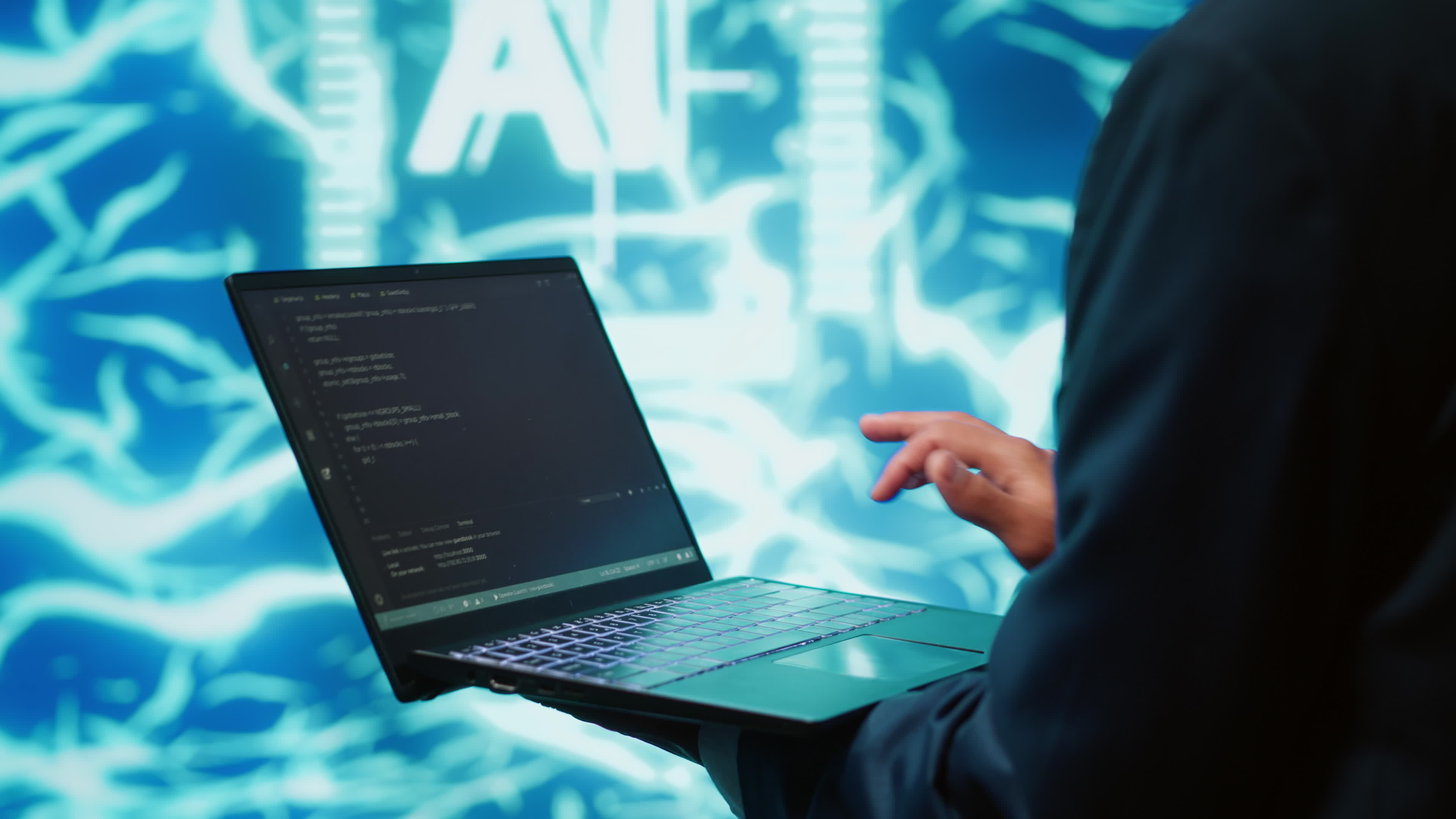 Technician uses laptop and AI neural networks modeled after human brain ... Technician uses laptop and AI neural networks modeled after human brain ...