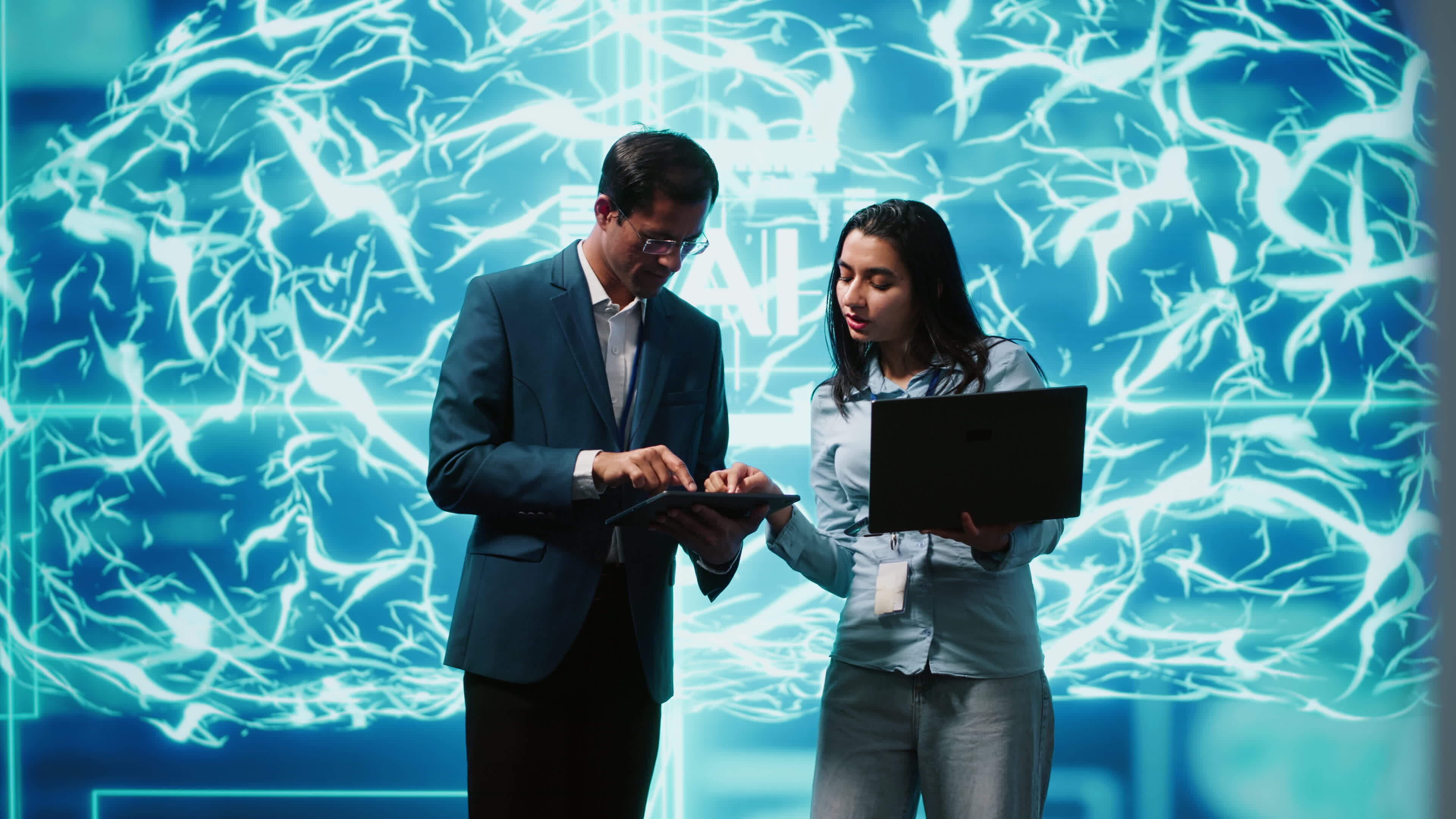Teamworking colleagues using AI neural networks modeled after human ... Teamworking colleagues using AI neural networks modeled after human ...