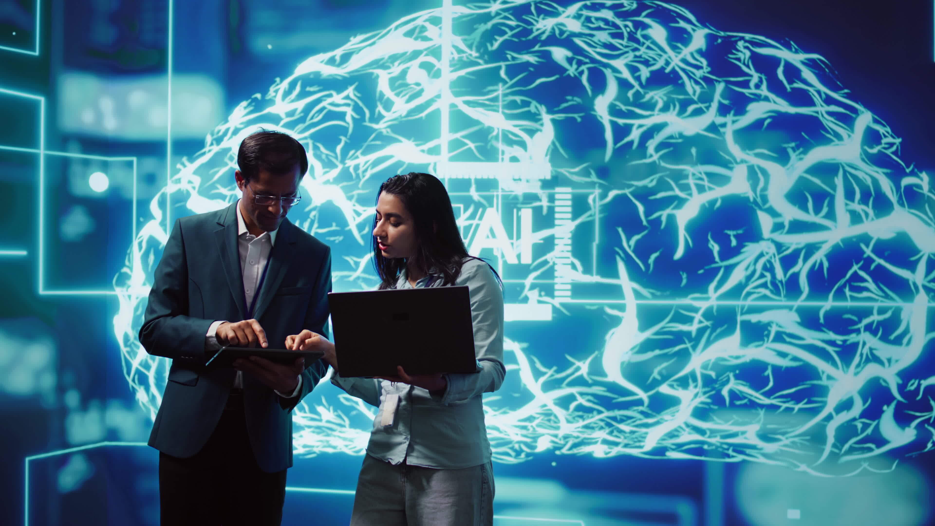 Teamworking colleagues using AI neural networks modeled after human ... Teamworking colleagues using AI neural networks modeled after human ...