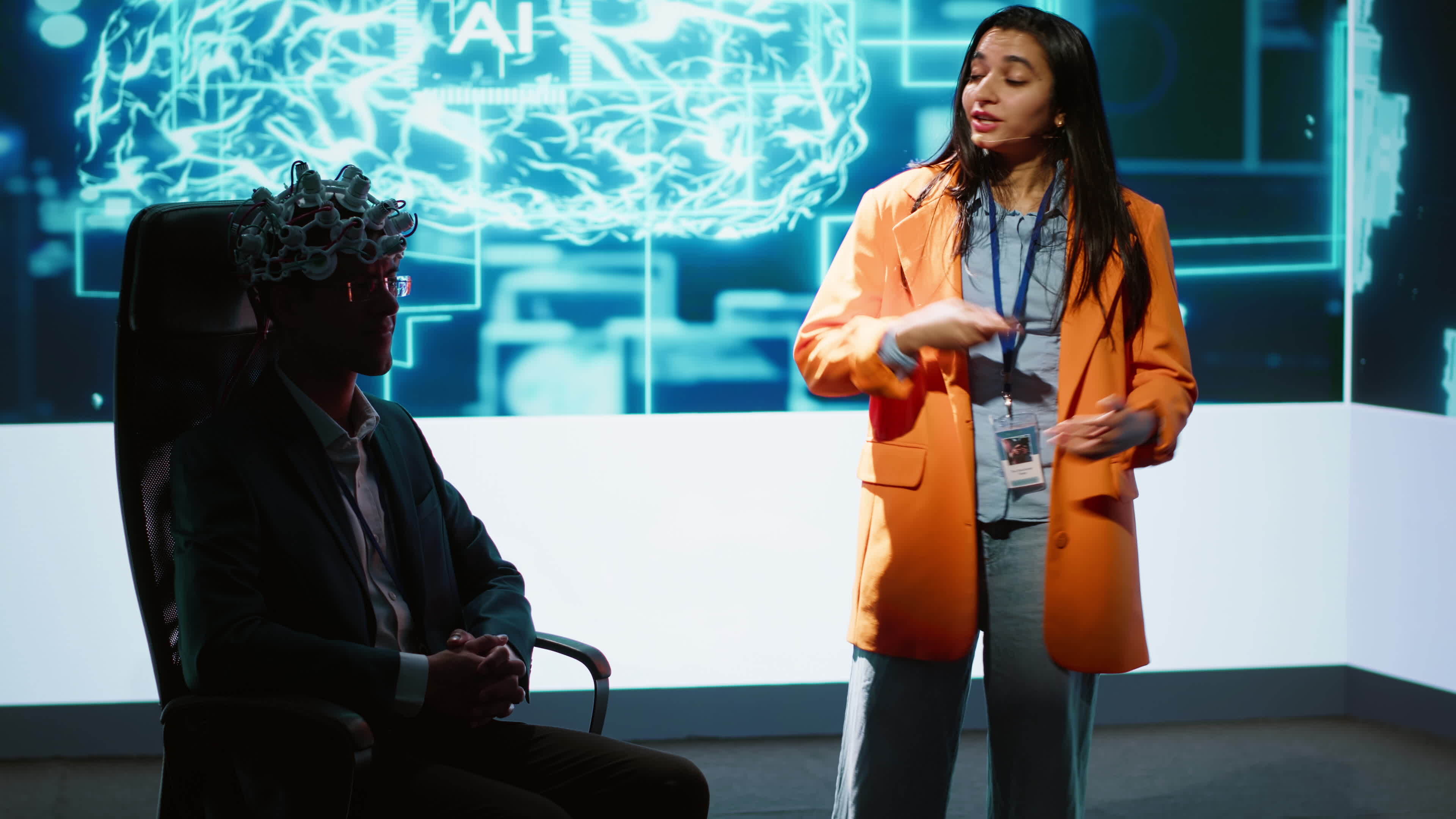 Neuroscientist doing demonstration at AI convention gathering tech startups and academics ...