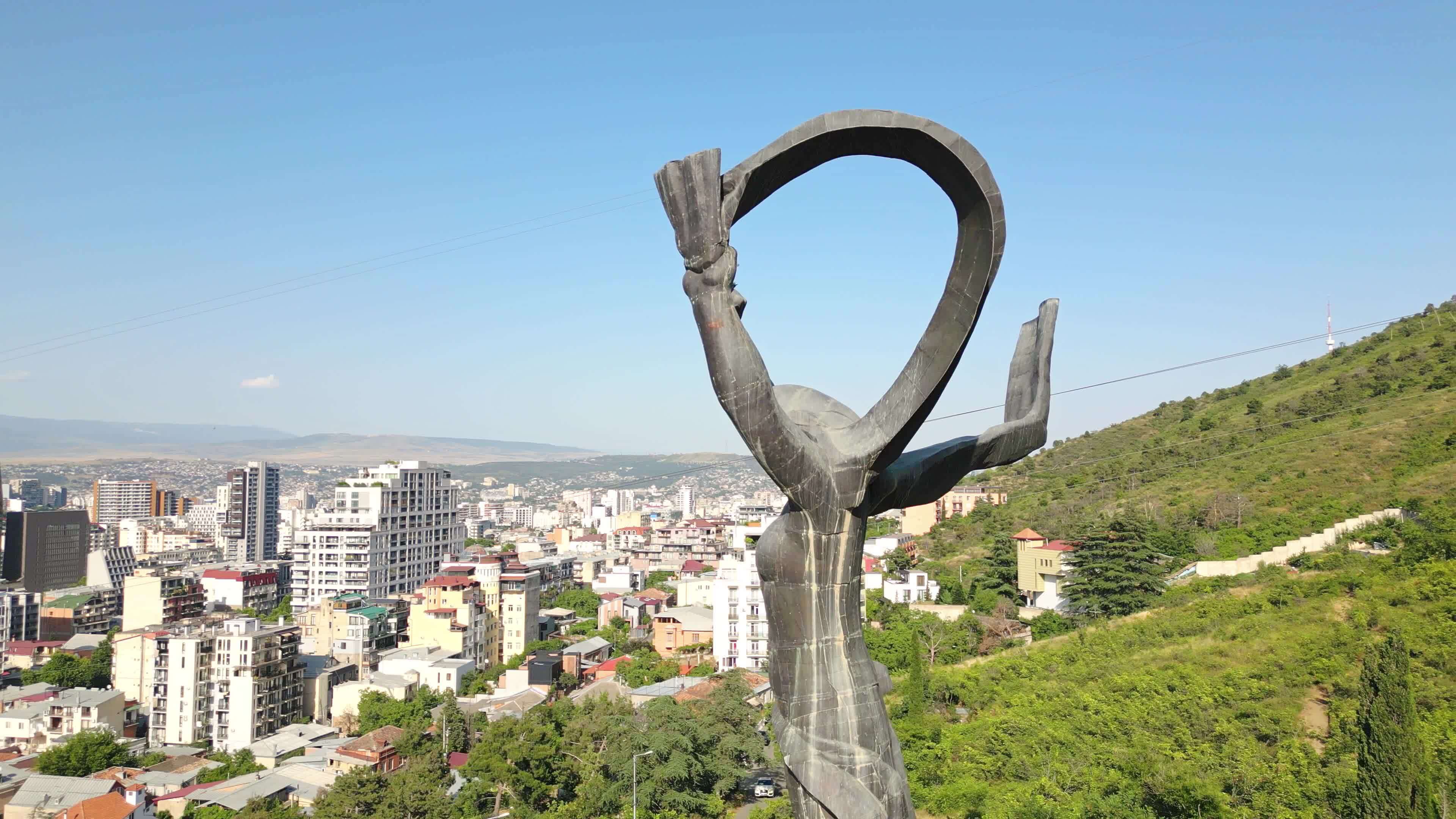Tbilisi, Georgia -4th july, 2024 - Aerial panning view Victory statue ... Tbilisi, Georgia -4th july, 2024 - Aerial panning view Victory statue ...