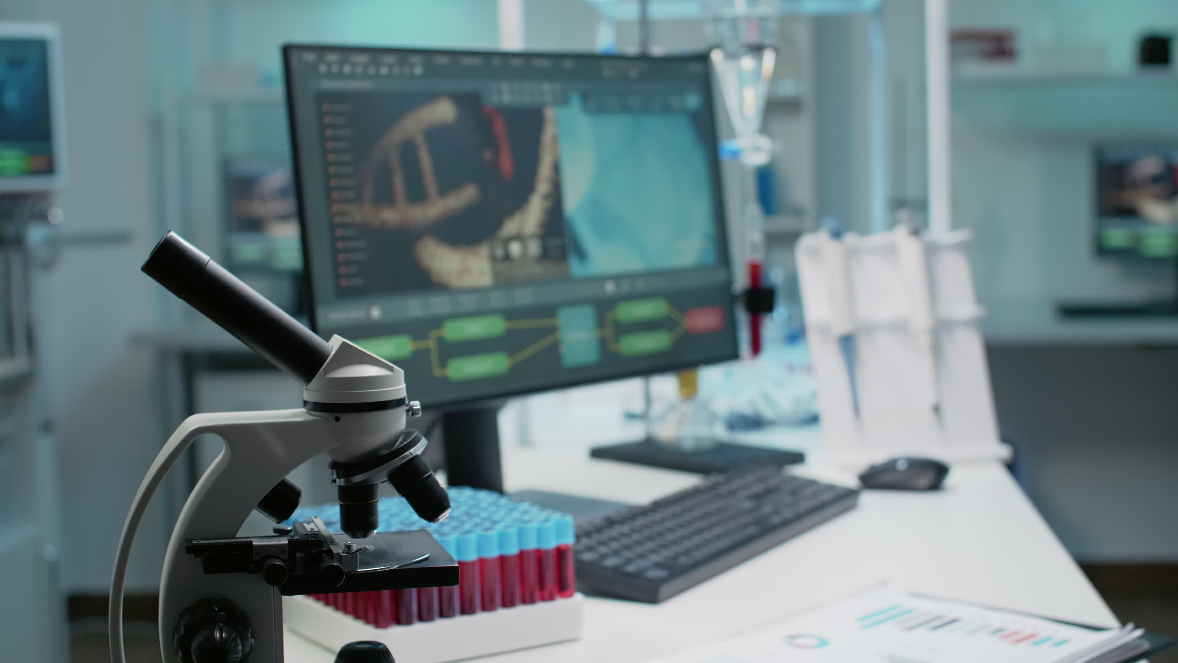Empty laboratory with dna animation on computer and chemical equipment ...