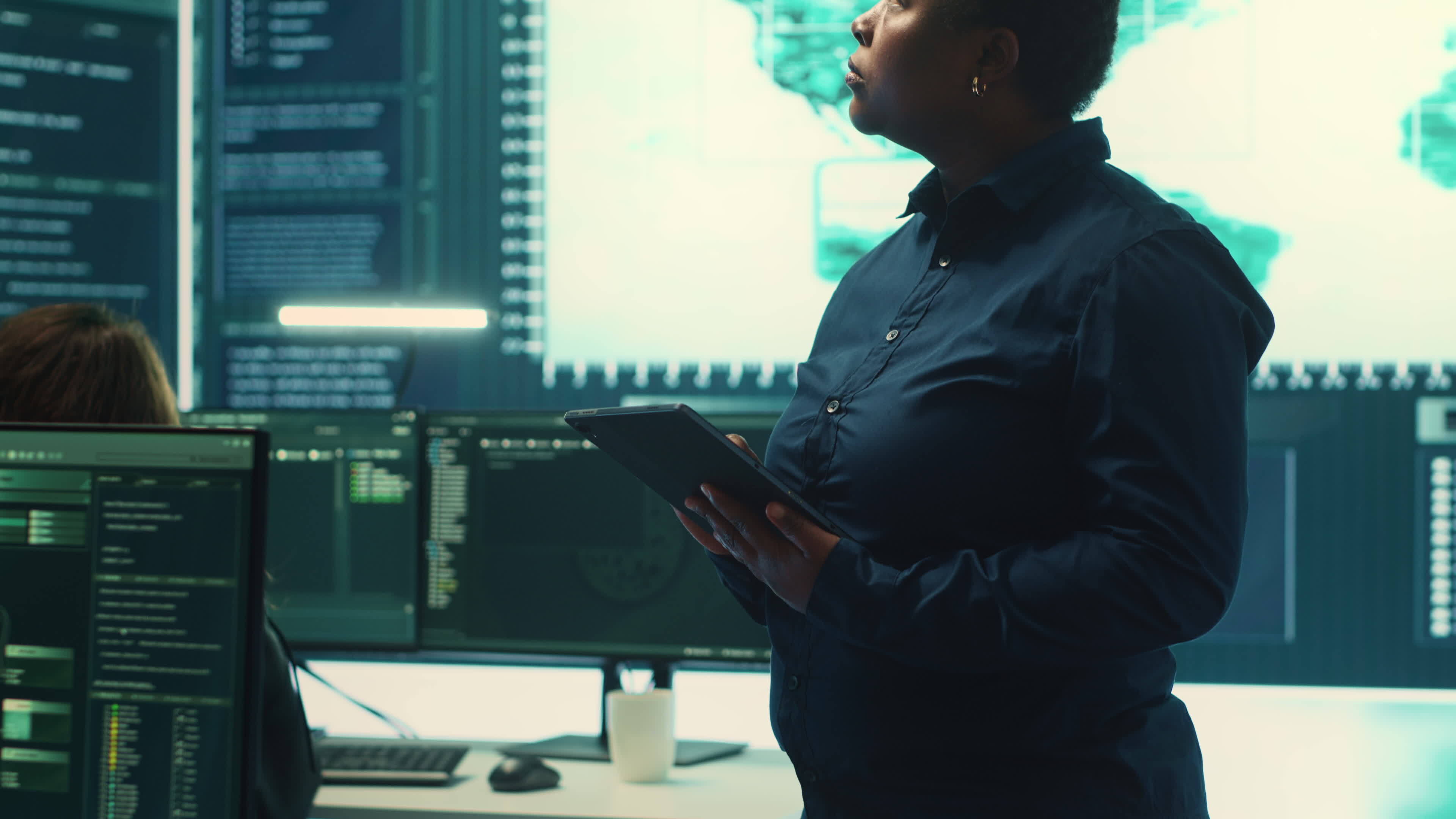 Governmental Hackers Working On Computer Network In High Tech Office Focusing On Data Security