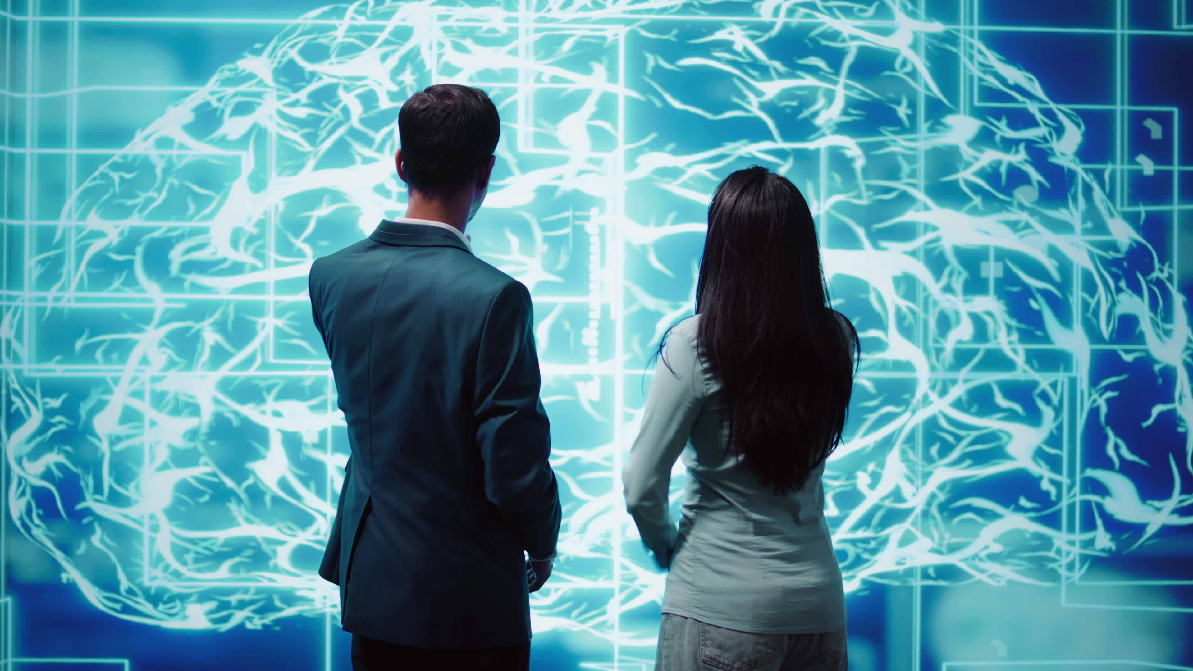 Teamworking colleagues implementing artificial intelligence parallel processing, breaking up ...