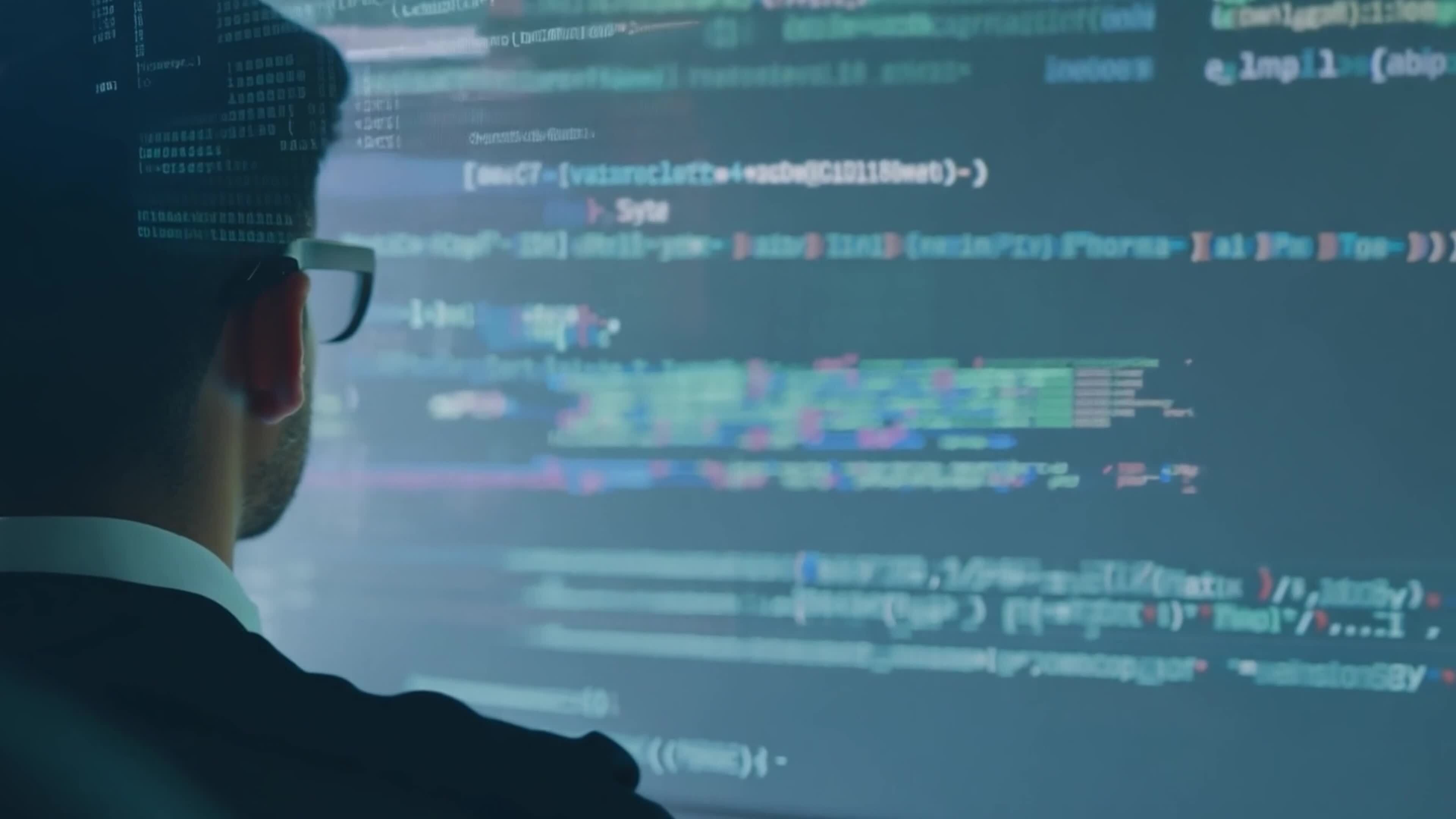A Software Developer Working On A Complex Coding Project Multiple Lines Of Code Filling The