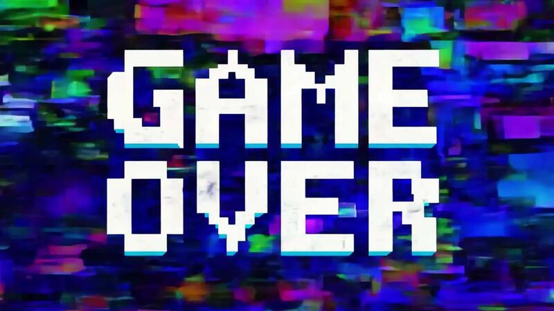 Retro arcade game with Game Over message appearing on a distorted ... Retro arcade game with Game Over message appearing on a distorted ...