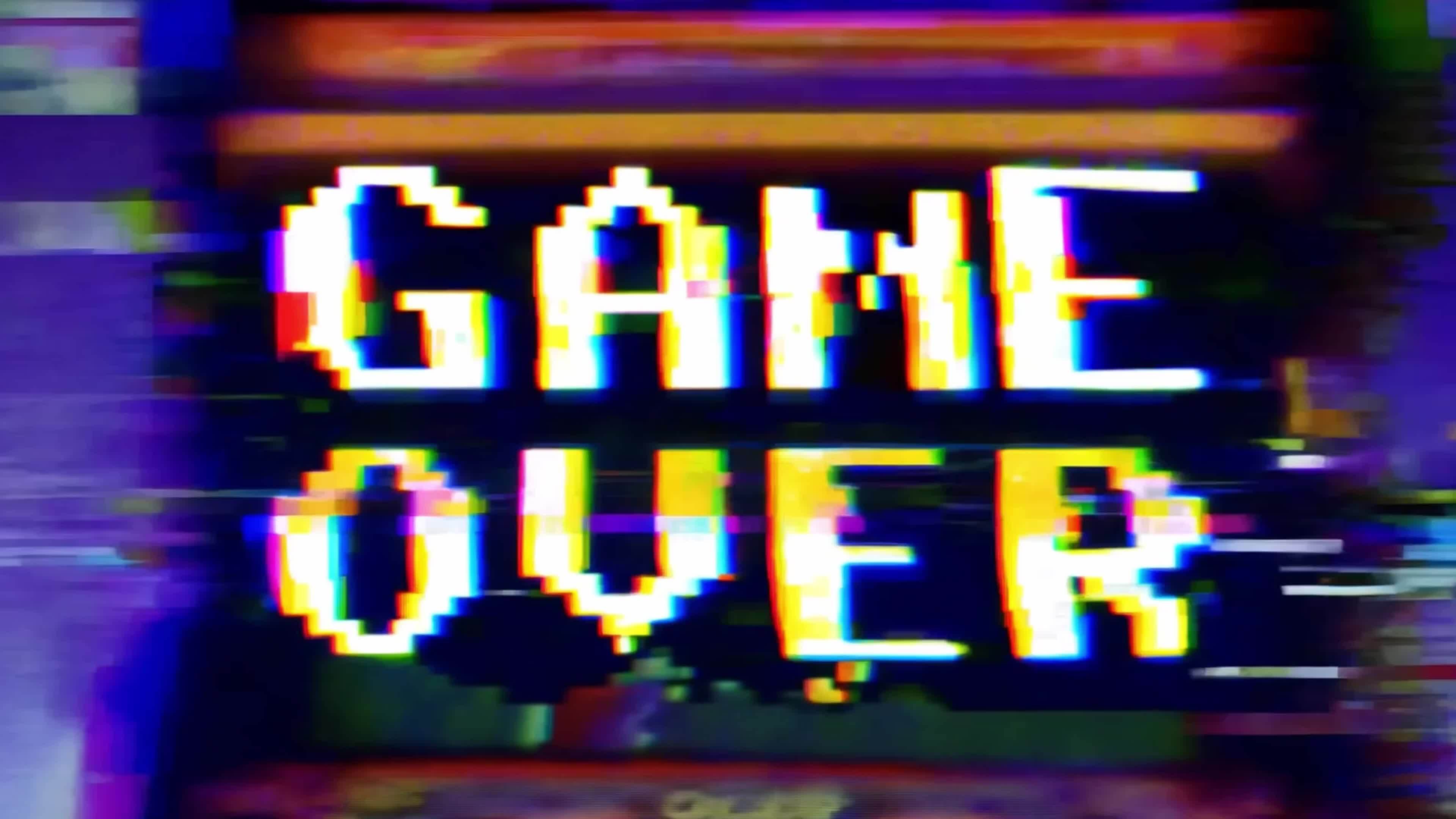 Retro arcade game with Game Over message appearing on a distorted ... Retro arcade game with Game Over message appearing on a distorted ...