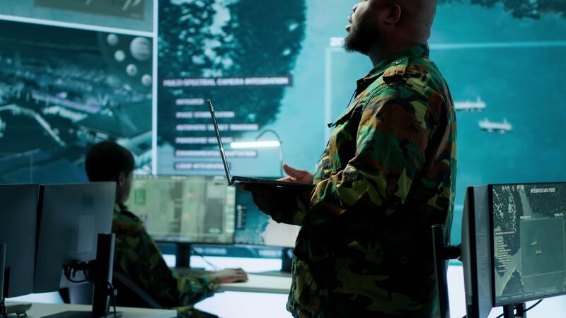 Military Team Manages Cybersecurity Operations In A High Tech Control Center Base Of Operations
