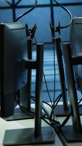 Vertical Computers In Server Farm Used To Ensure Optimal Performance And Reliability Managing