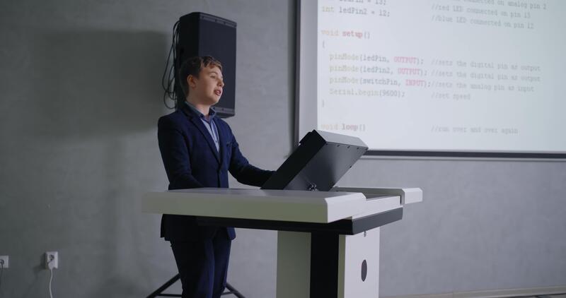 Smart Teen Boy Presenting Computer Science Project In Classroom, Future ...