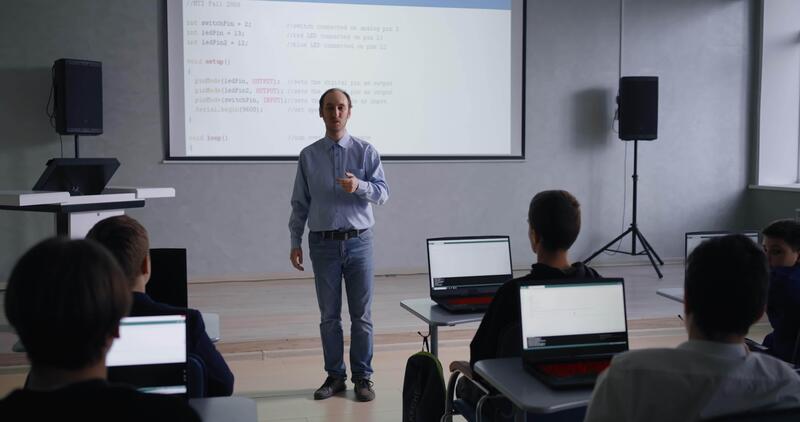 Middle-Aged Professor Of Computer Science And Programming Teaching ...