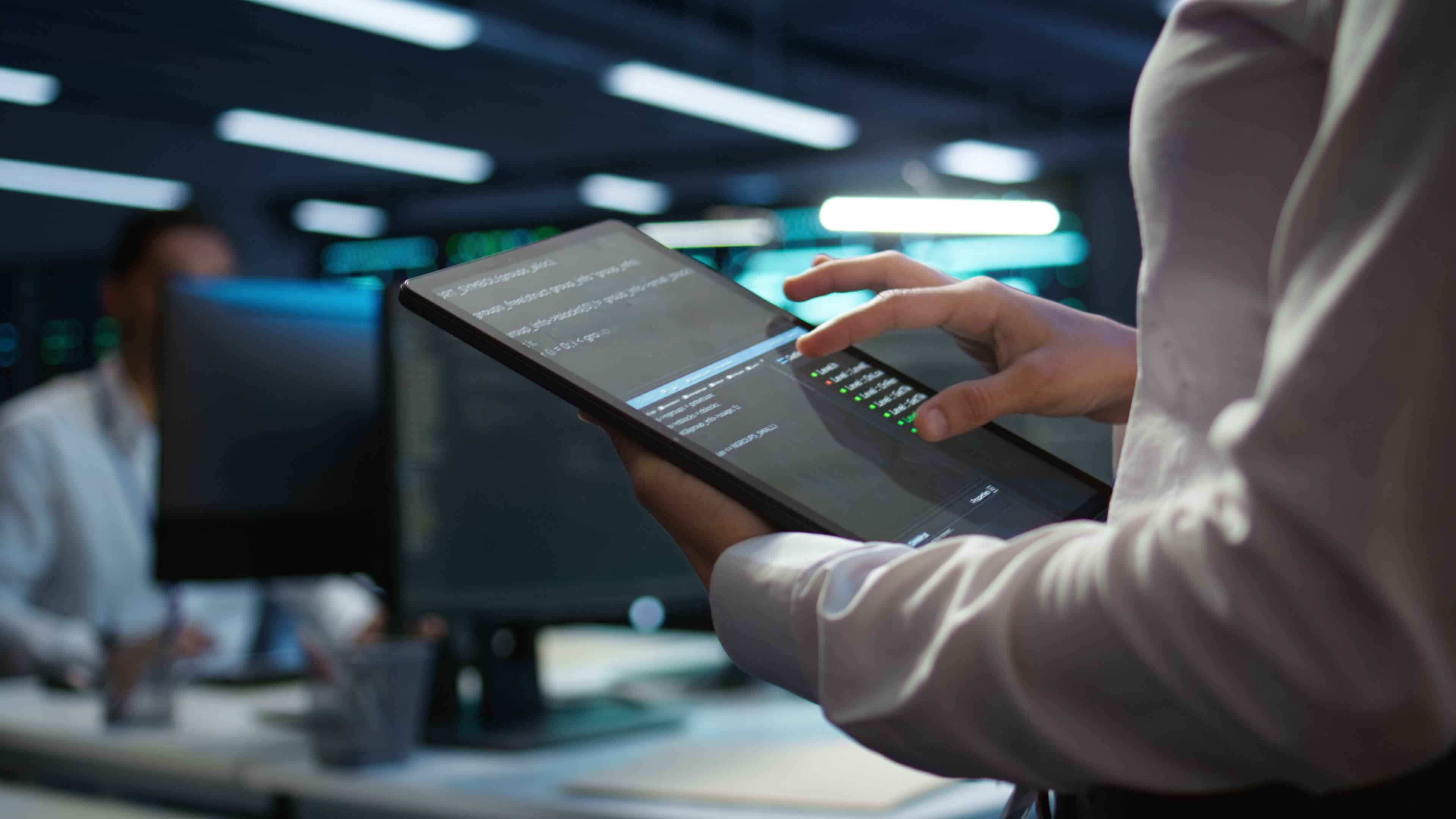 Engineer Working In Data Center Used For Managing Infrastructure Rigs