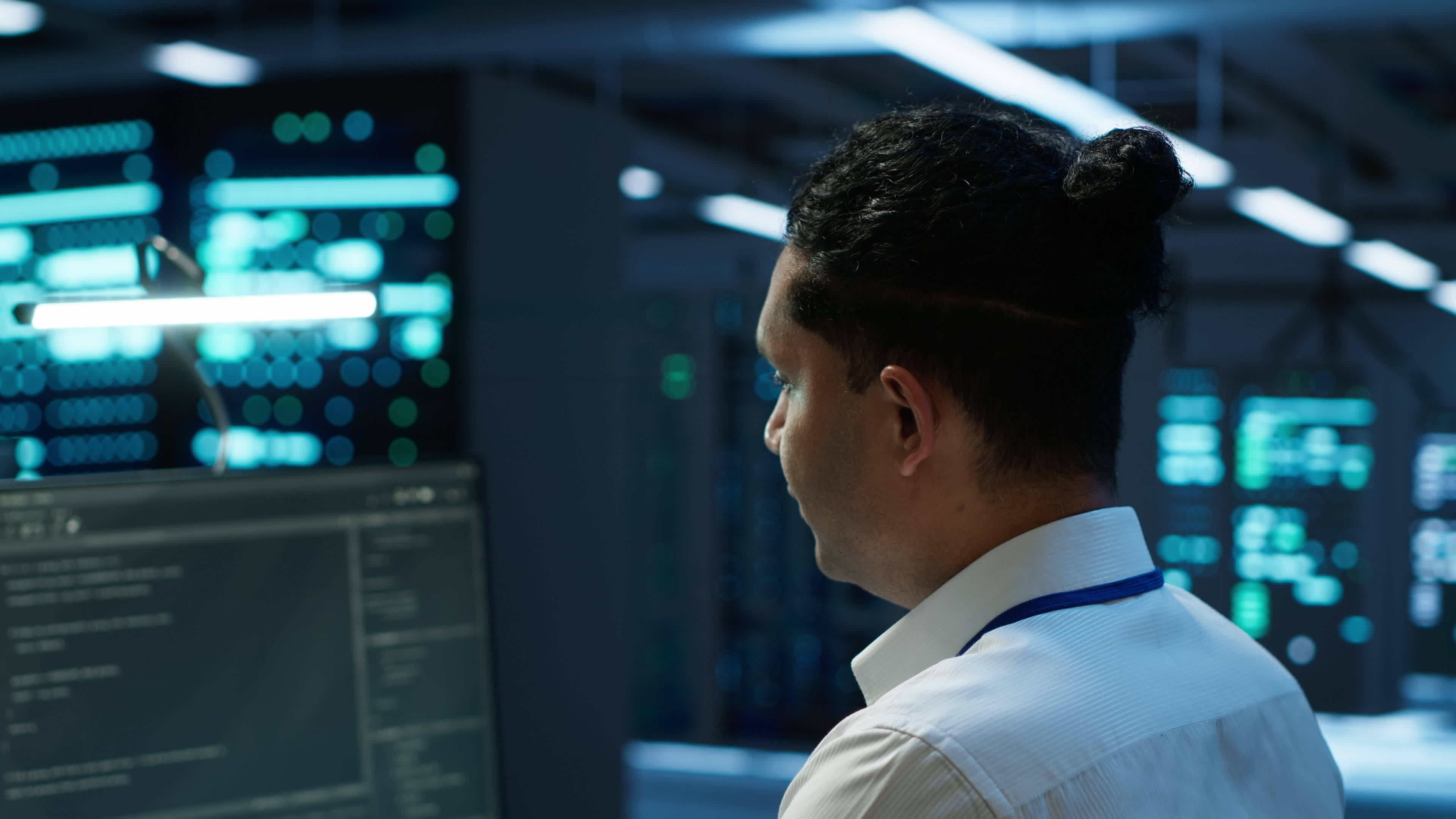Portrait Of Smiling Technician In Data Center Implementing And Managing Infrastructure To Ensure