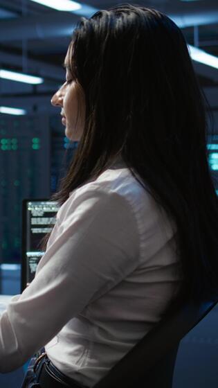 Vertical Software developer in data center ensuring system can handle networking tasks. IT ...