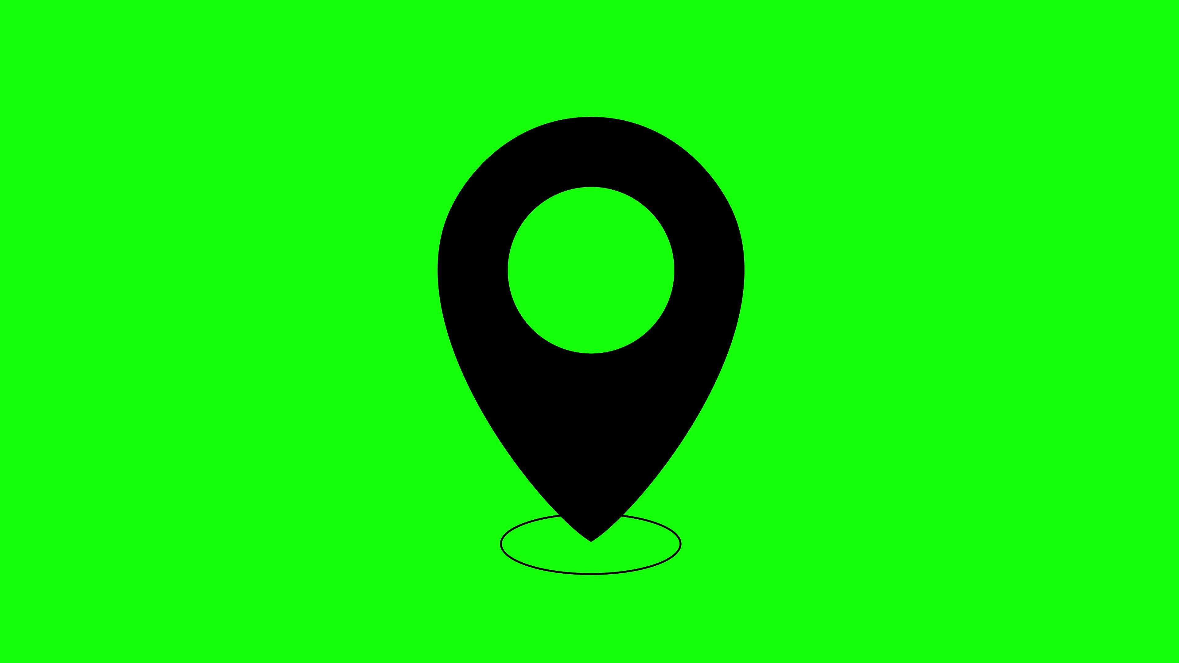 Animated black GPS location indicator and locator icon on a green ...