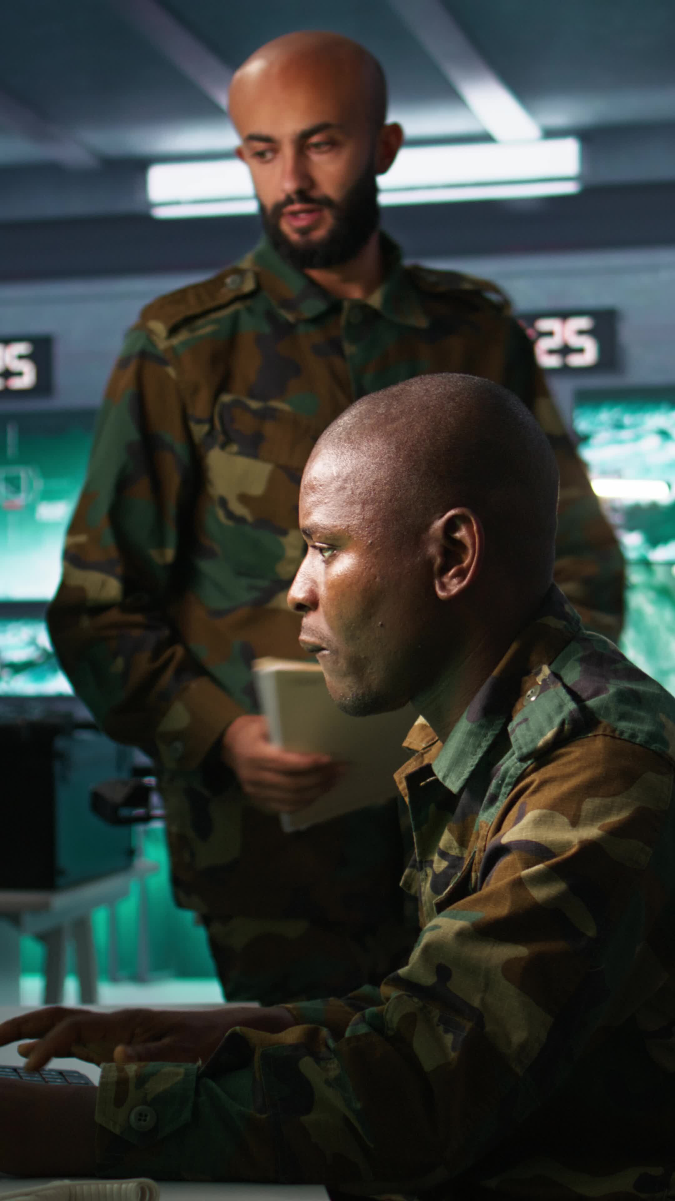 Vertical Team of military officers in command center look at intel folder files on enemy battle ...