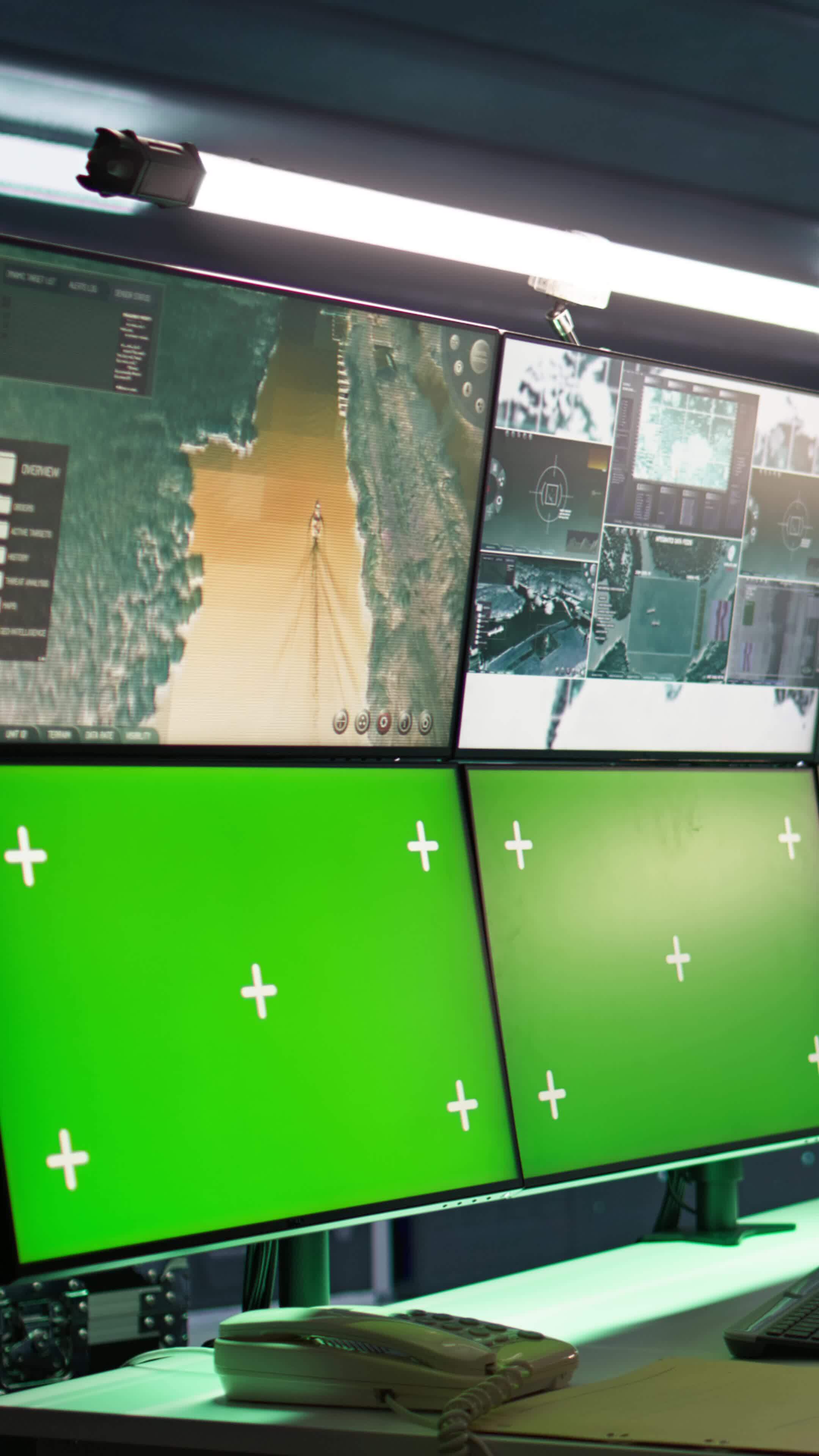 Vertical Military Agent Working In Control Room Using Isolated Screen Software On Laptop