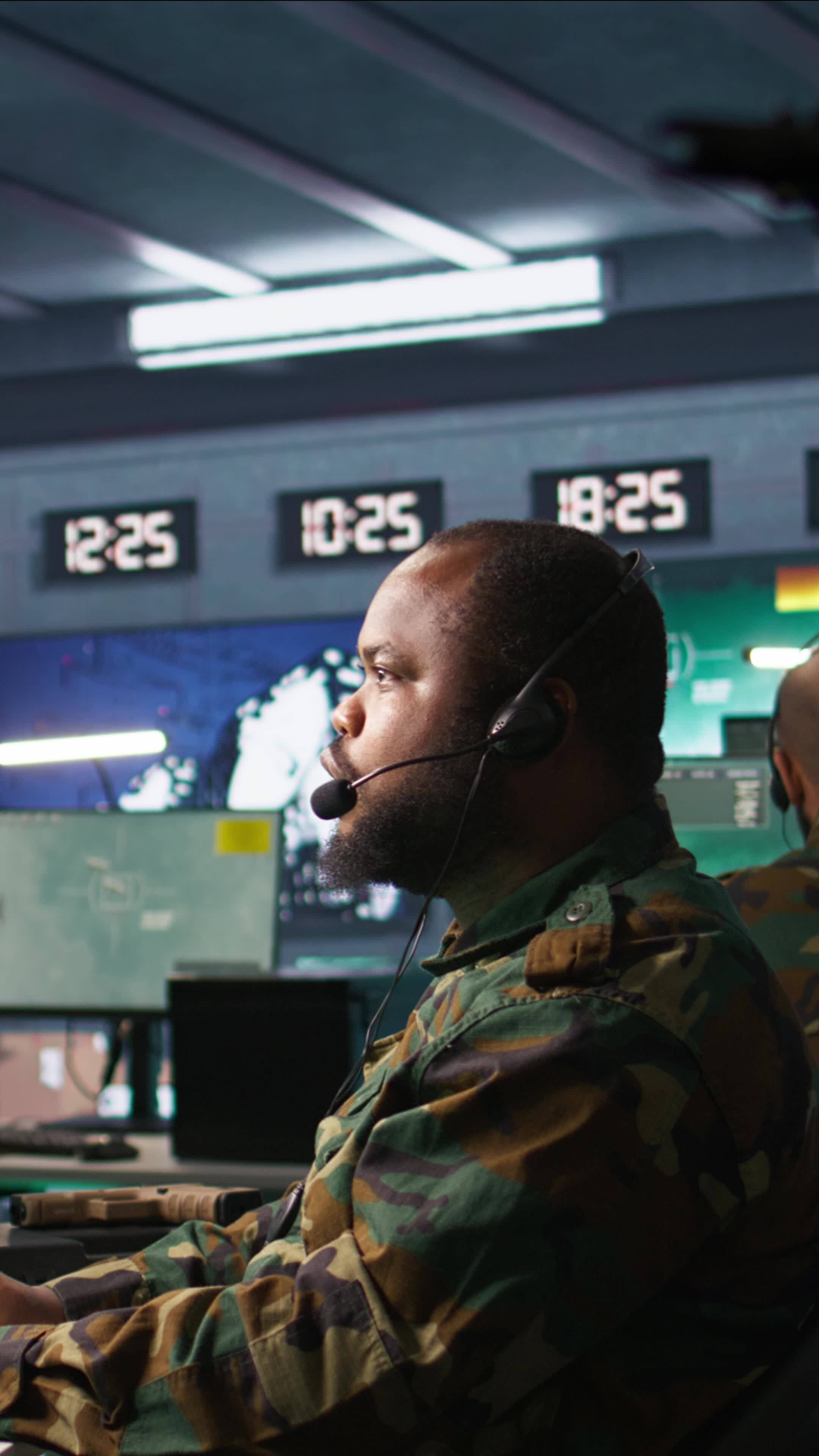 Vertical Army telecommunication systems operator providing combat support using gathered ...