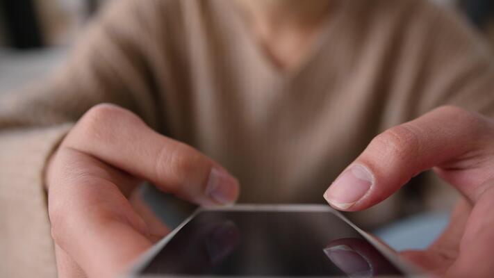 Person Scrolling On Phone Stock Video Footage for Free Download