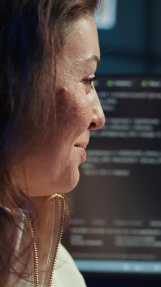 Vertical Delighted Programmer Celebrating After Filtering Malicious