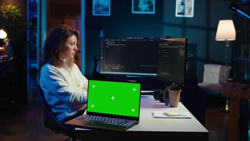 Programmer designing and developing software applications using ... Programmer designing and developing software applications using ...
