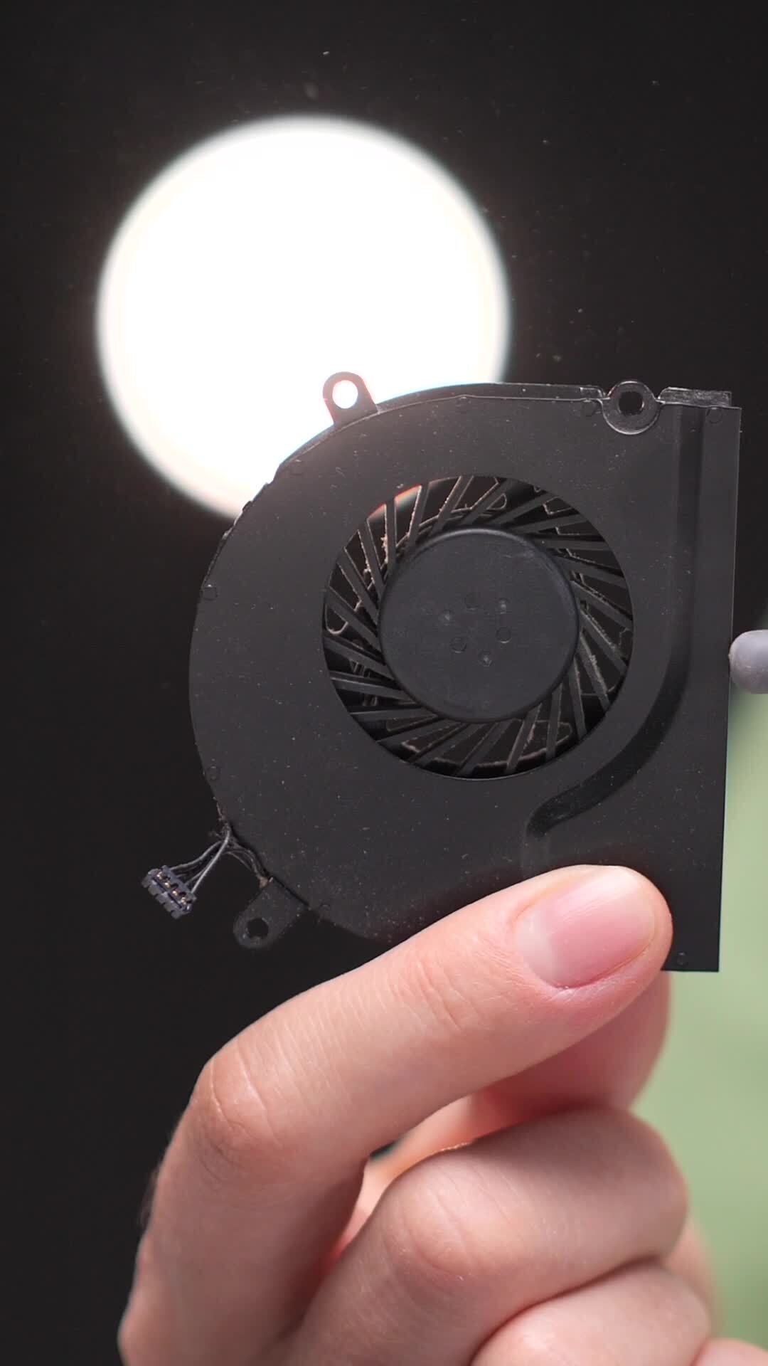 Vertical Technician Cleaning Laptop Cooling Fan Using Blower 50090063 Stock Video At Vecteezy