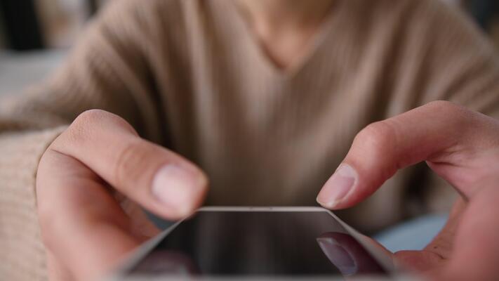 Person Scrolling On Phone Stock Video Footage for Free Download