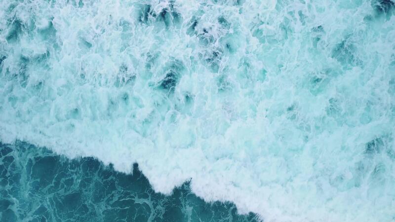 Beautiful texture of big power dark ocean waves with white wash. Aerial ...