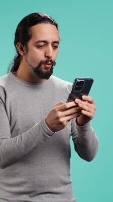 Person Scrolling On Phone Stock Video Footage for Free Download