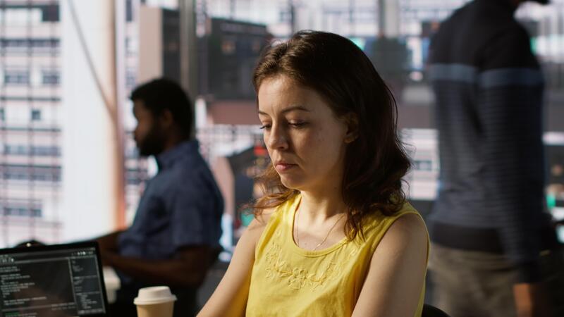 Portrait Of Smiling Programmer Creating Machine Learning Models That Can Process And Analyze