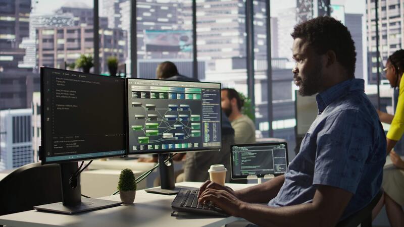 System Administrator At Work Creating Machine Learning Models That Can Process And Analyze Data