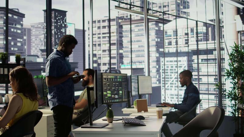 Computer Scientist Resuming Work After Strolling In Workspace Doing Software Debugging Using Pc