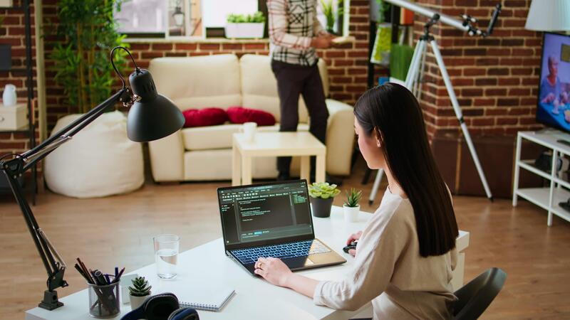 Software Developer Types Programming Code In A Cozy Home Office Setup 7121