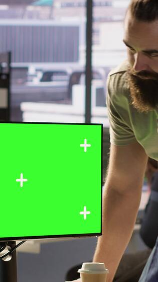 Vertical Developer Using Mockup Pc Being Assisted By Colleague To Fix