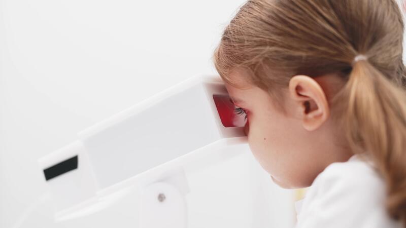 A young girl engages in orthoptic and pleoptic therapy using advanced ... A young girl engages in orthoptic and pleoptic therapy using advanced ...