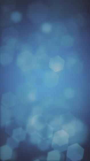 Abstract bokeh background animation with gently flickering defocused blue bokeh light hexagons ...