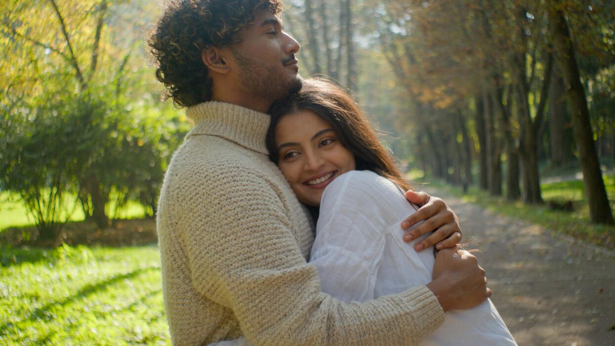 Two People Hugging Stock Photos, Images and Backgrounds for Free Download