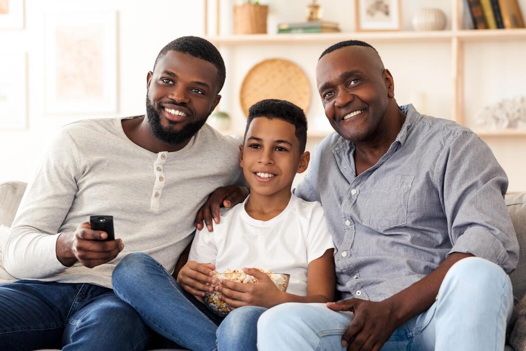African Family Watching Tv Stock Photos, Images and Backgrounds for Free Download